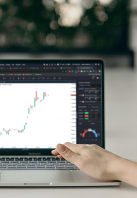 photo of person using tablet SmartTrader